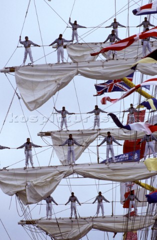 48-9158: Tall ship crew standing on footlines of yard - : Asset Details ...